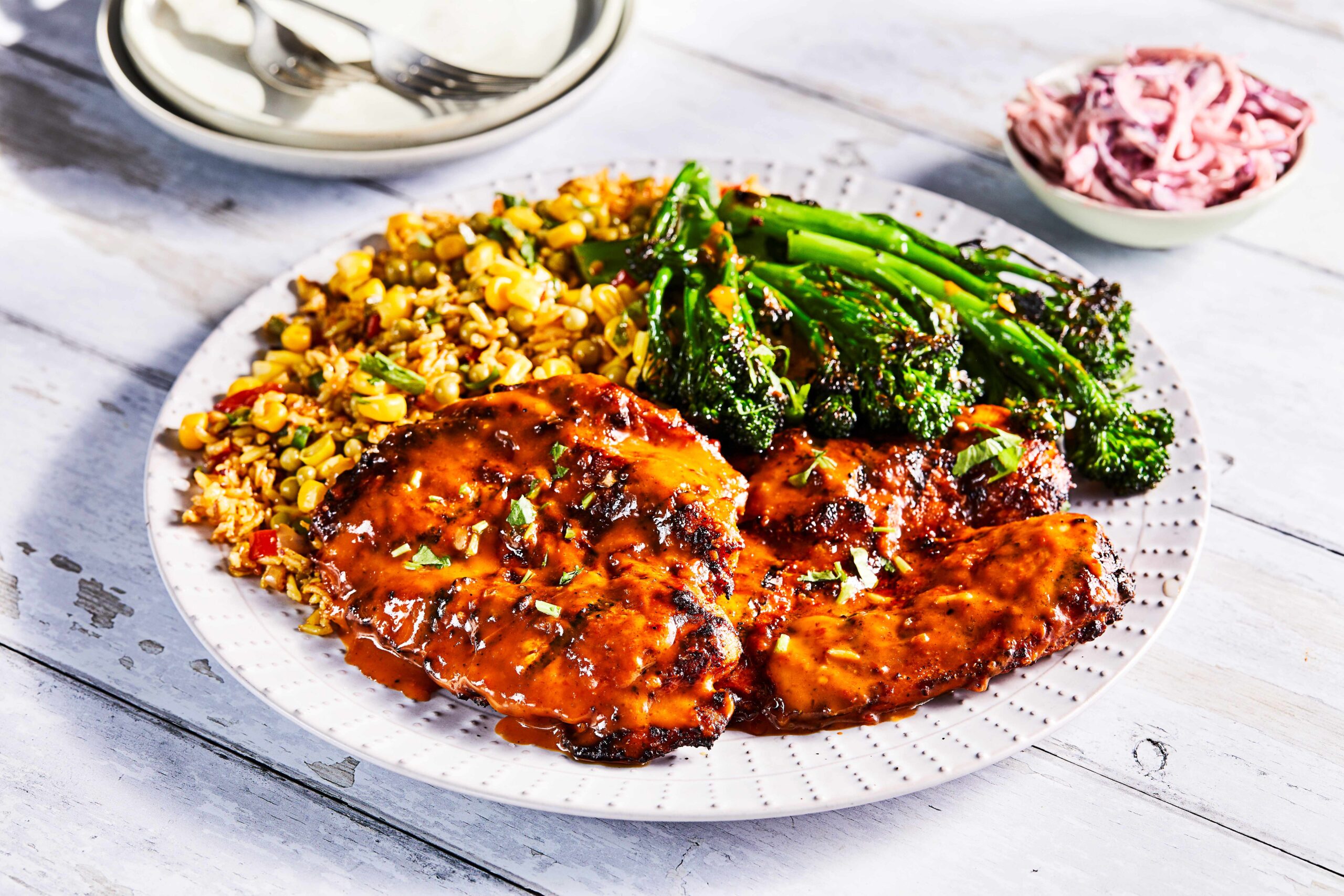 Peri Peri Chicken with spicy rice, chargrilled tenderstem broccoli and ...
